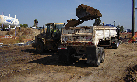 Waste being loaded for disposal at landfill in Nevada - The Bodhi Group